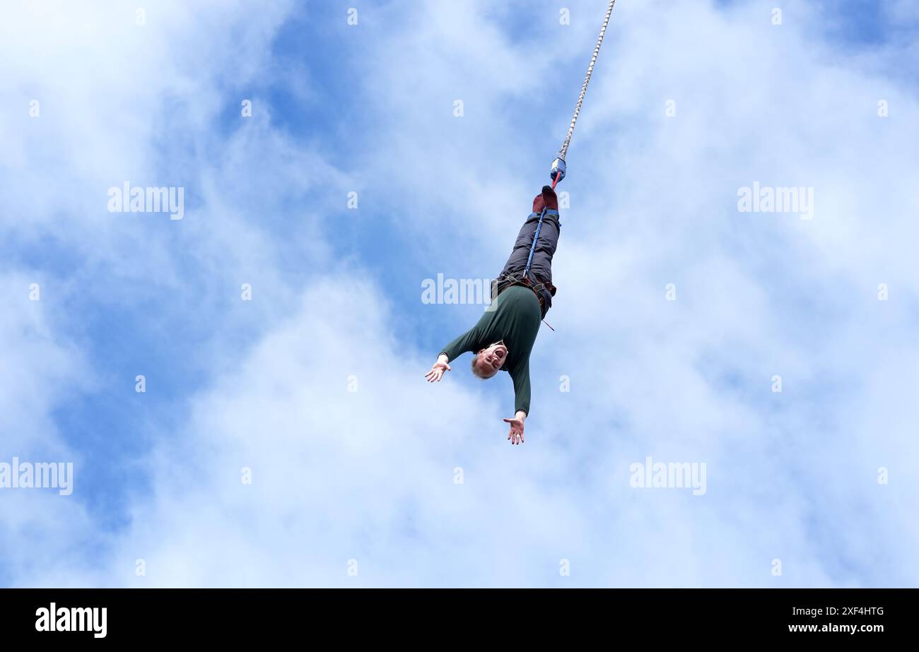 Liberal Democrat leader Sir Ed Davey taking part in a bungee jump ...