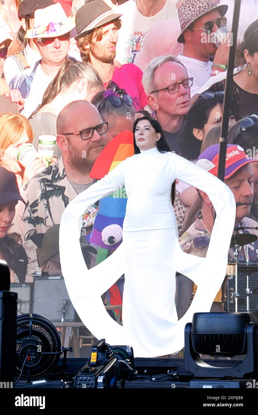 Marina Abramovic invites festival goers to join a seven minute silence ...