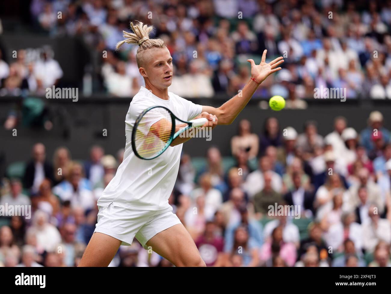 Mark Lajal in action against Carlos Alcaraz (not pictured) on day one ...