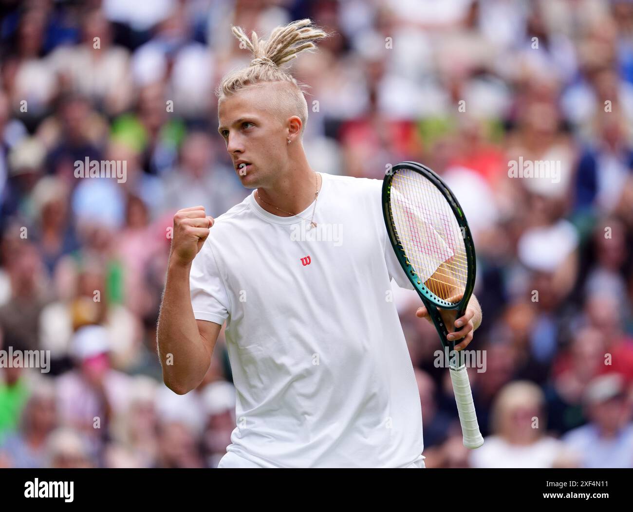 Mark Lajal in action against Carlos Alcaraz (not pictured) on day one ...
