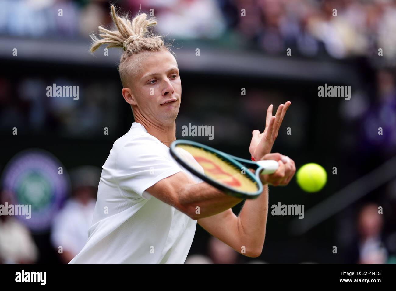 Mark Lajal in action against Carlos Alcaraz (not pictured) on day one ...