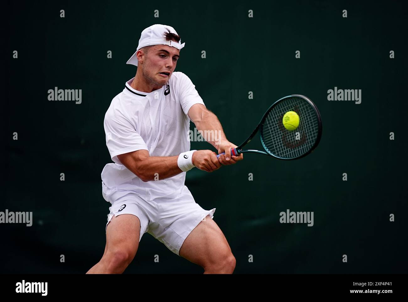 Arthur Fery in action against Daniel Altmaier (not pictured) on day one ...