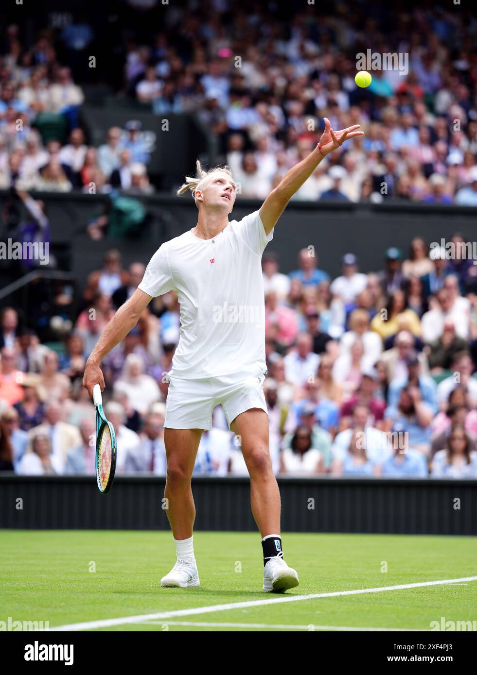 Mark Lajal in action against Carlos Alcaraz (not pictured) on day one ...