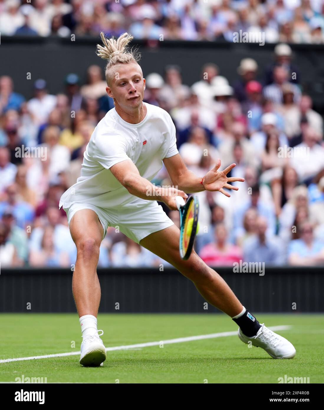 Mark Lajal in action against Carlos Alcaraz (not pictured) on day one ...