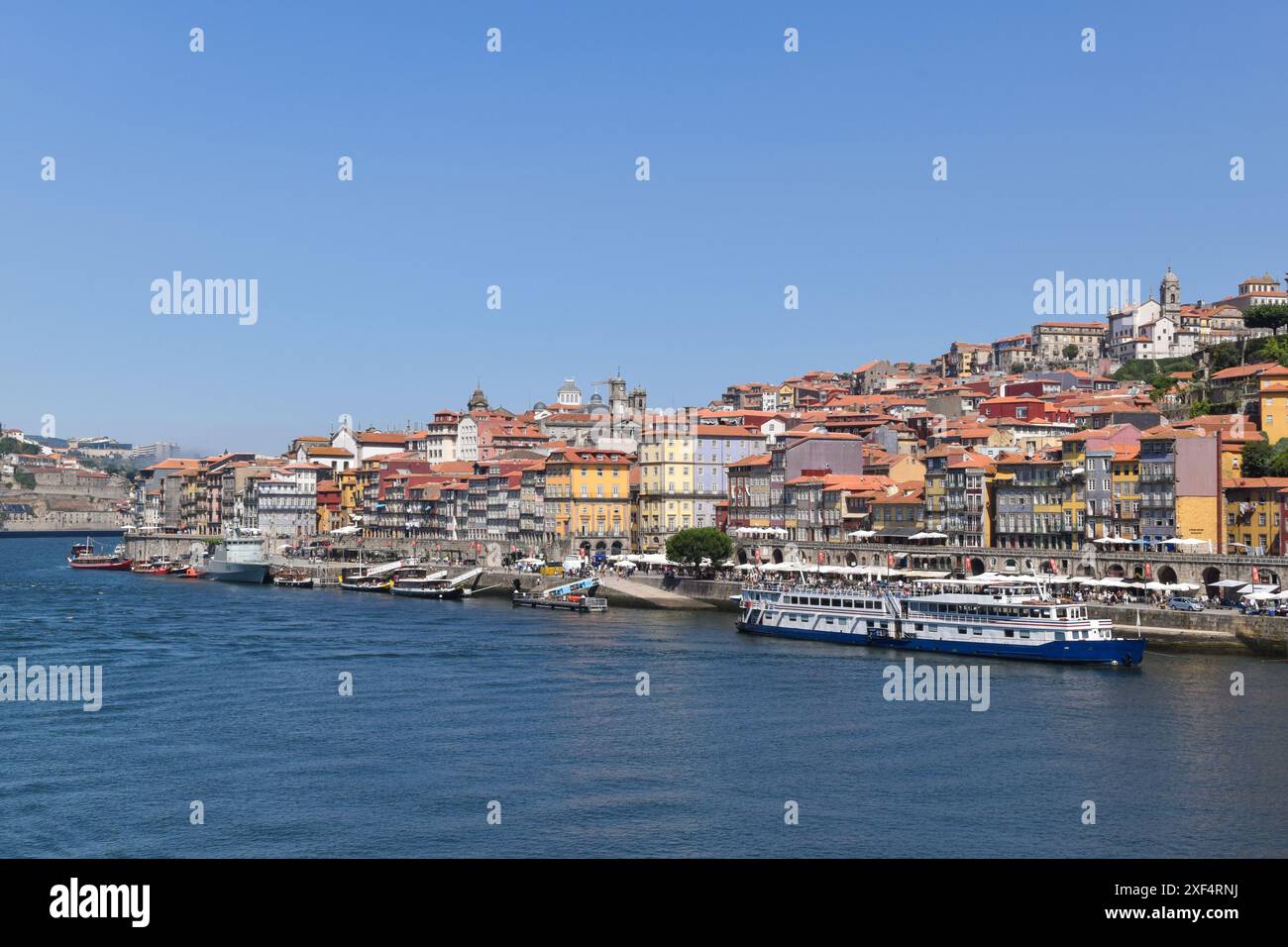 A vibrant view of Porto's colorful riverside buildings along the Douro ...