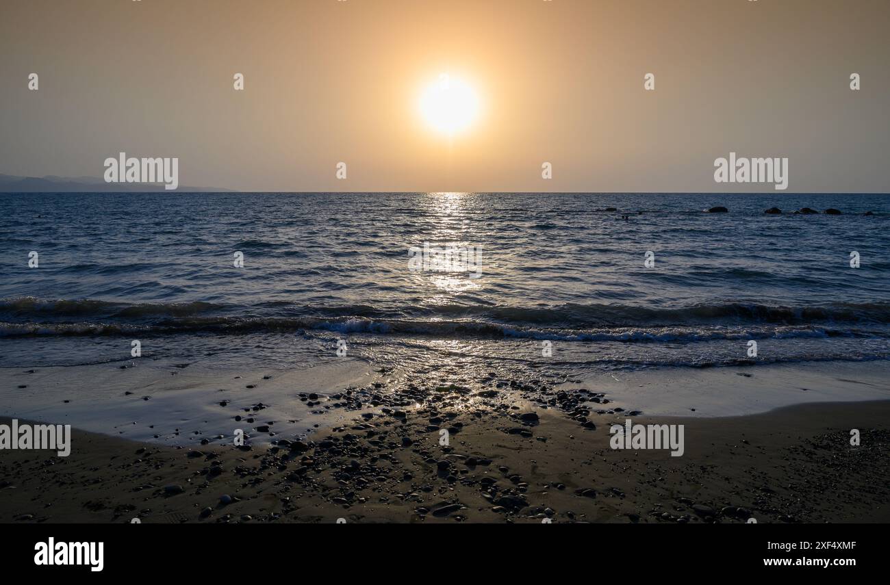Beautiful sunset sky at beach in Cyprus Stock Photo - Alamy