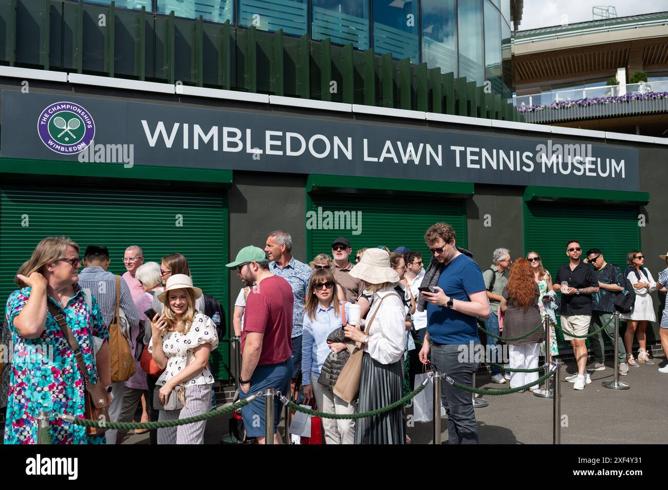 London, UK. 1st July, 2024. Spectators queueing outside Wimbledon on ...