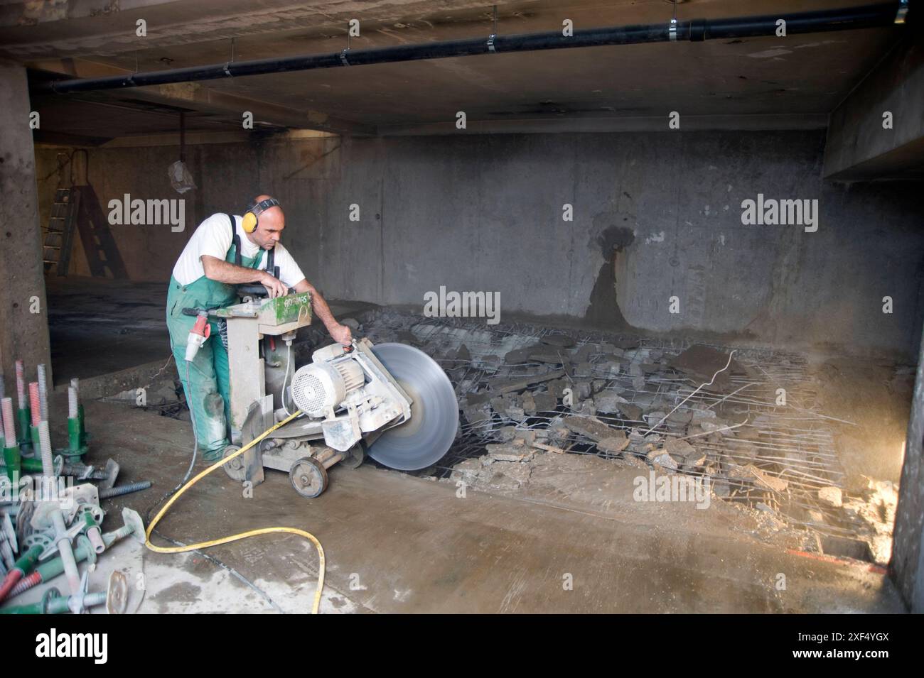 Portrait Construction Worker Construction Worker overhauling the 1950 s ...