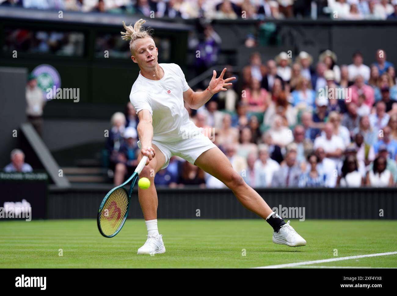 Mark Lajal in action against Carlos Alcaraz (not pictured) on day one ...