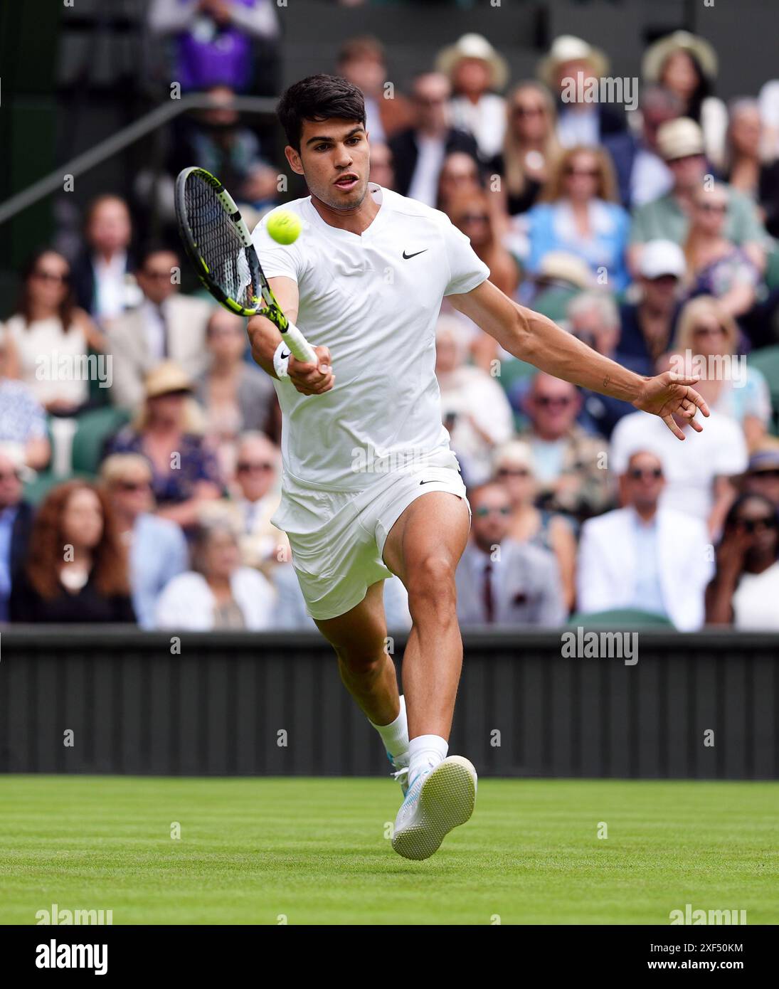Carlos Alcaraz in action against Mark Lajal (not pictured) on day one ...