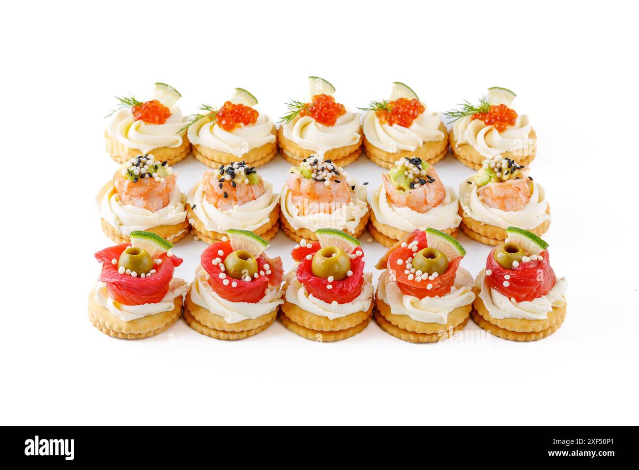 set of fresh delicious canapés with cream cheese, tuna, shrimp, avocado ...