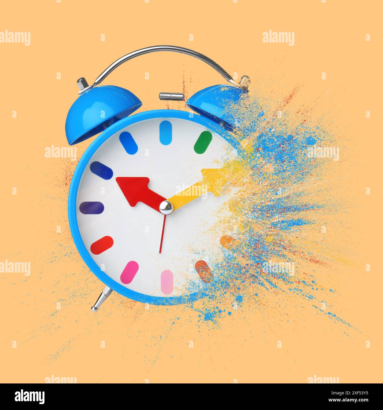 Bright alarm clock dissolving on dark beige background. Flow of time ...