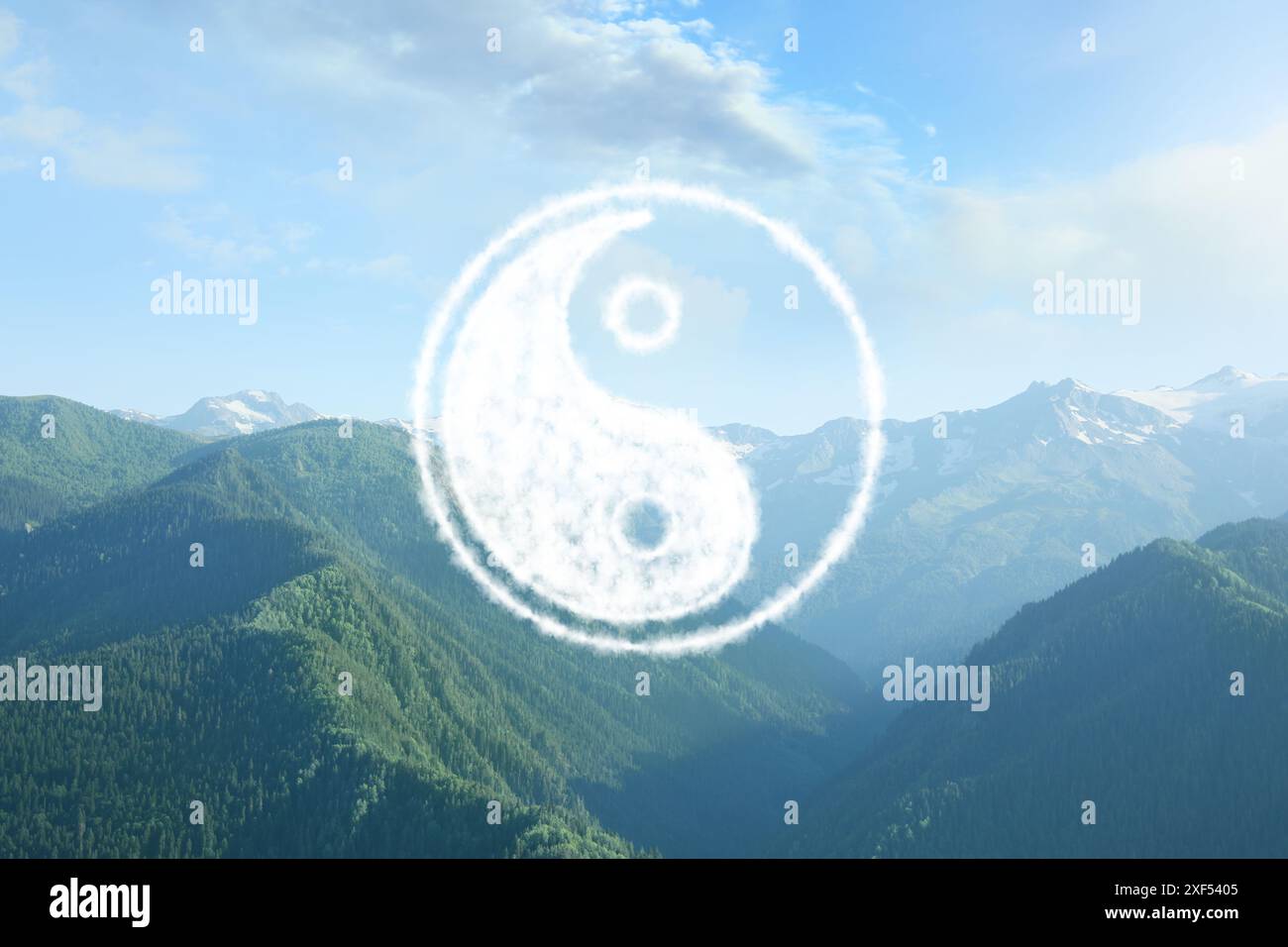 Yin and yang symbol against picturesque mountain landscape Stock Photo ...