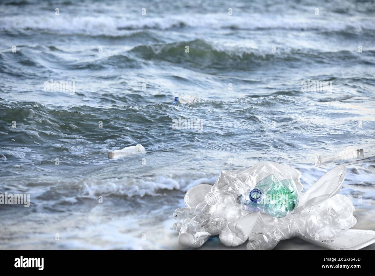 Sea with plastic garbage outdoors. Environmental pollution Stock Photo ...