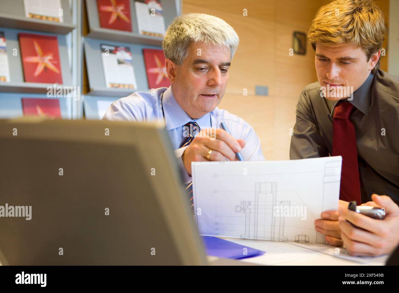 Executives explain hi-res stock photography and images - Alamy