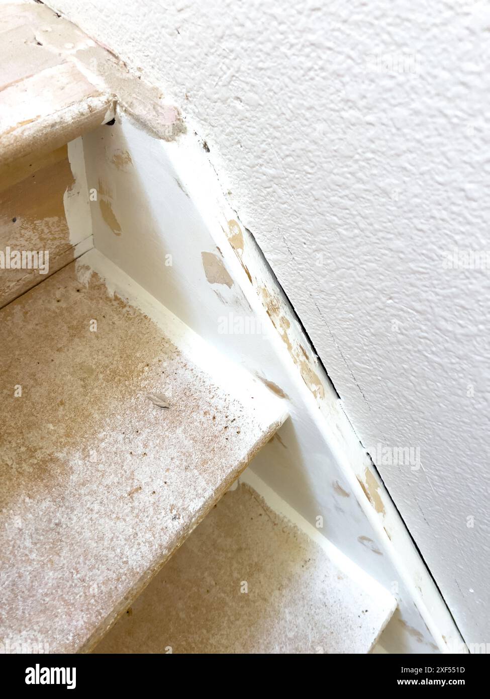 Close-Up View of Staircase Under Renovation with Unfinished Steps and ...