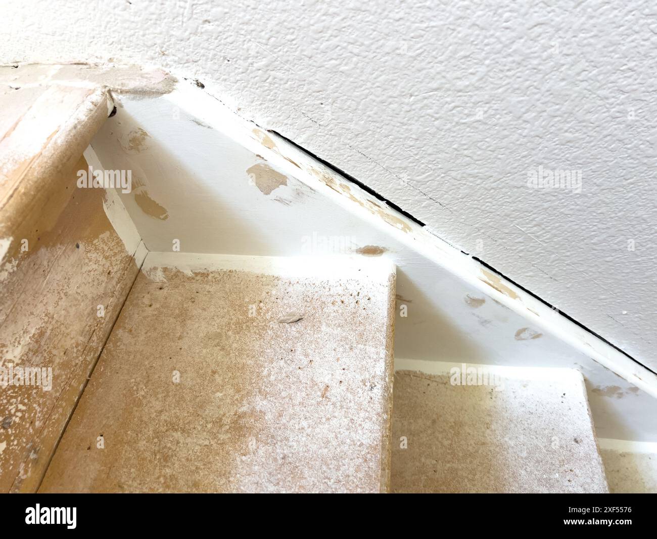 Close-Up View of Staircase Under Renovation with Unfinished Steps and ...