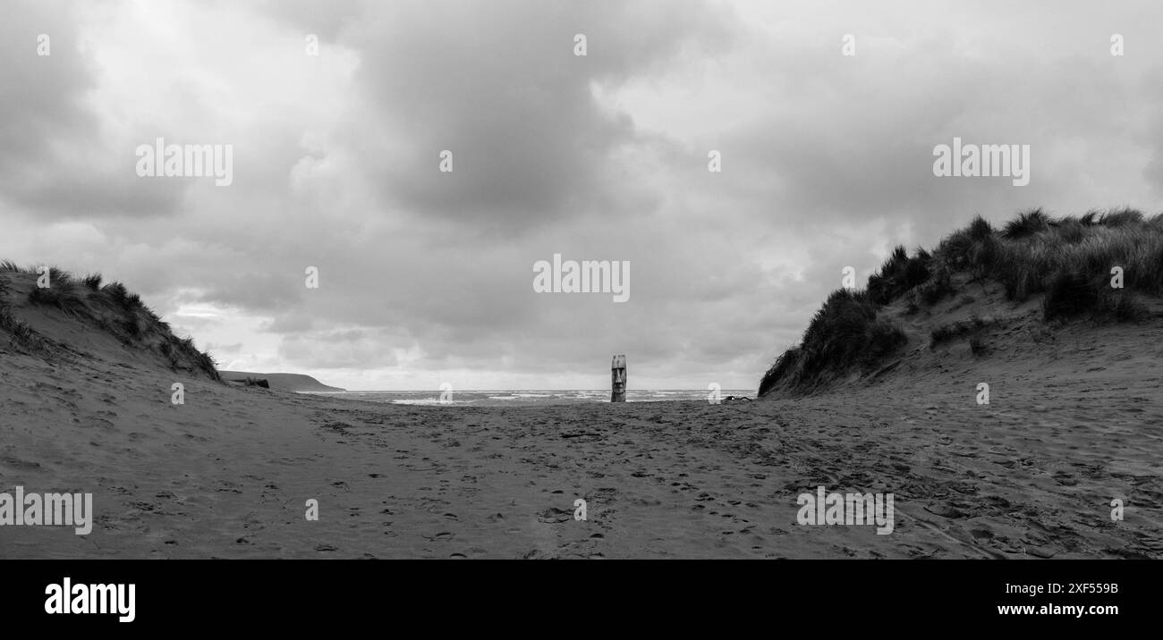 Wooden carving replicating the Easter Island Maoi Man. in the sand ...