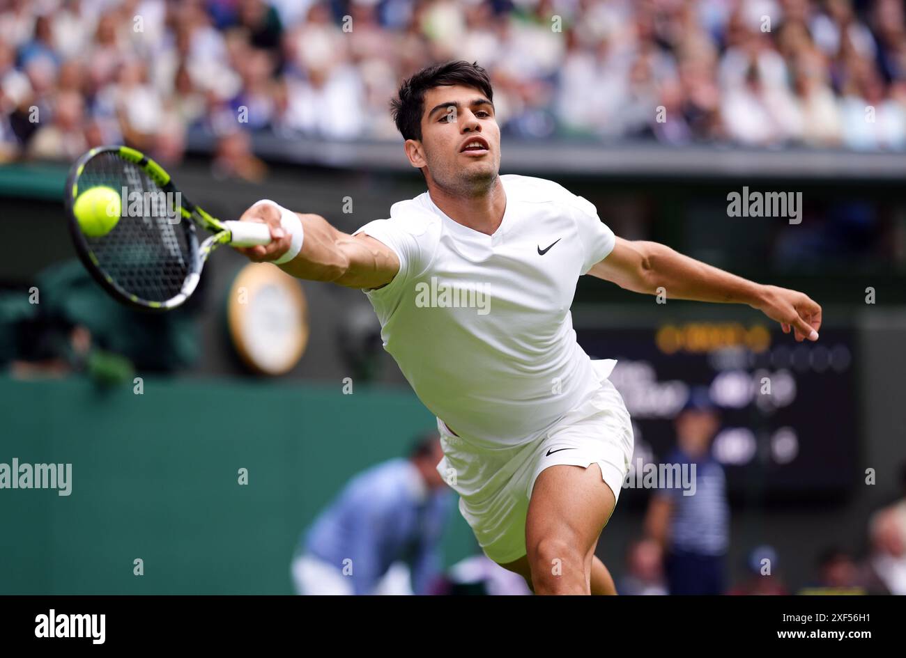 Carlos Alcaraz in action against Mark Lajal (not pictured) on day one ...