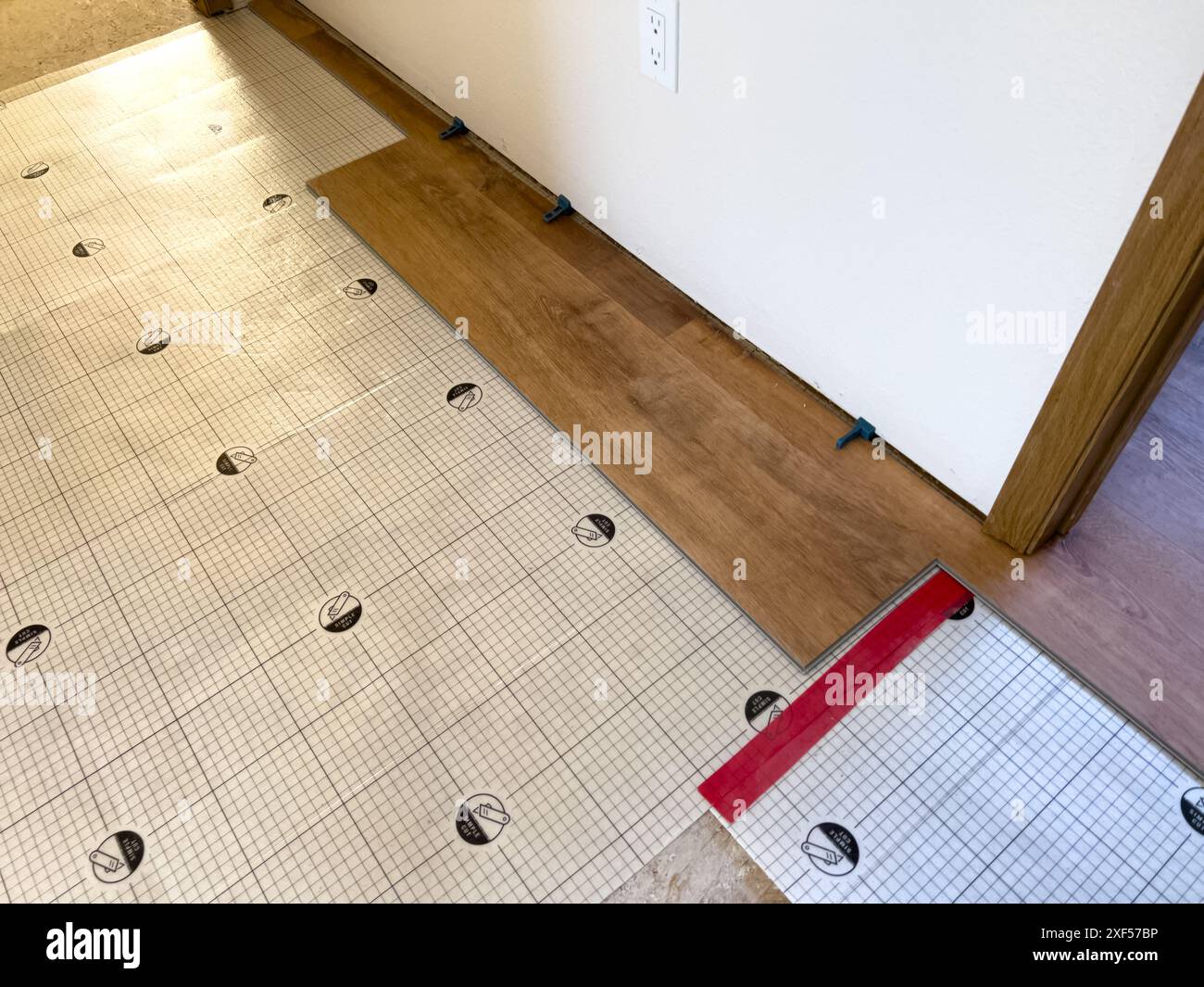 Installing Laminate Flooring with Underlayment in Home Renovation ...