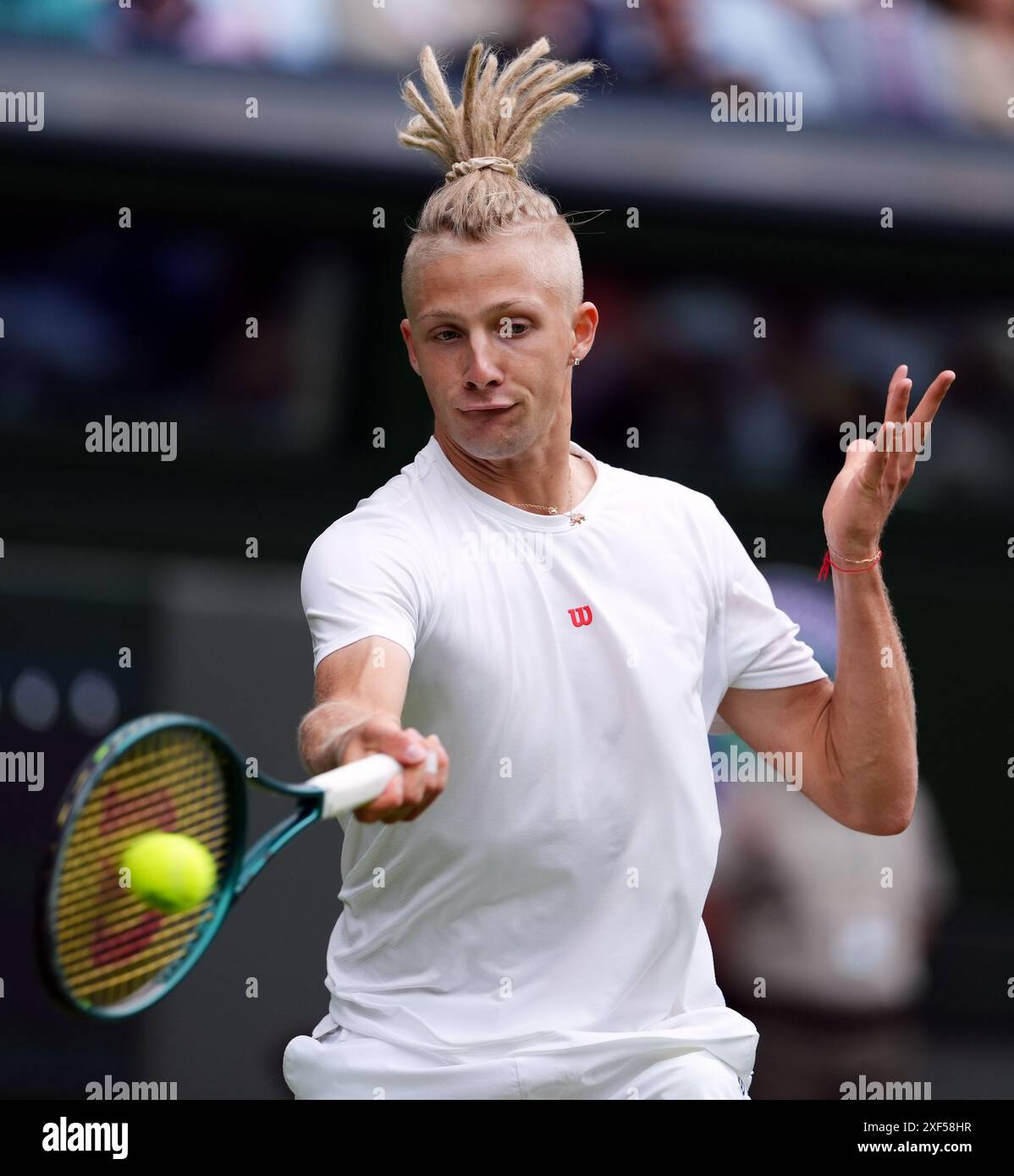 Mark Lajal in action against Carlos Alcaraz (not pictured) on day one ...