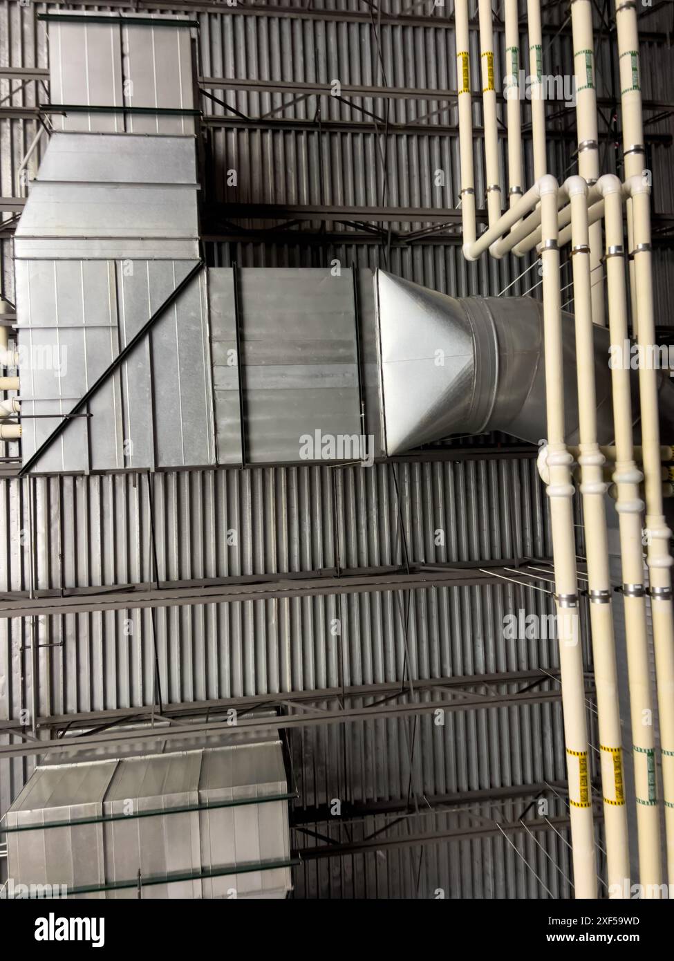 HVAC Ducts and Pipes in World Arena Building Ceiling Stock Photo - Alamy