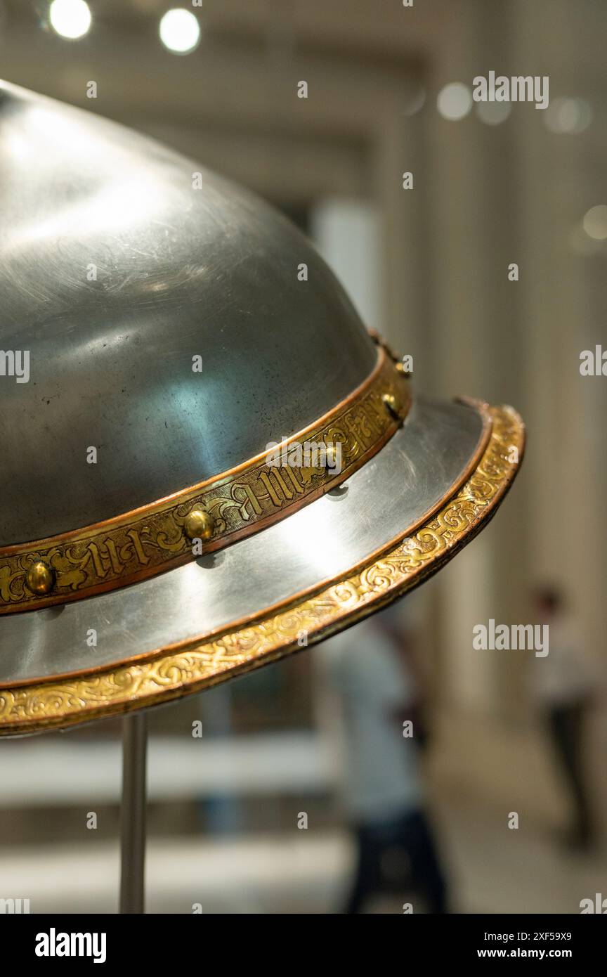 Vintage Silver and Gold Helmet on Display in a Museum Stock Photo - Alamy