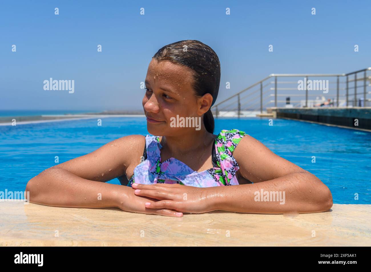 Girl 10 years old in the pool Stock Photo - Alamy