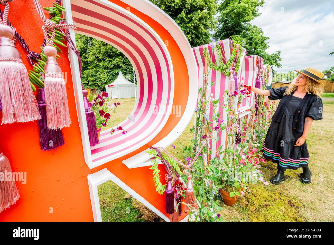 London, UK. 1st July, 2024. The RHS Sign created by Sohie Powell with ...