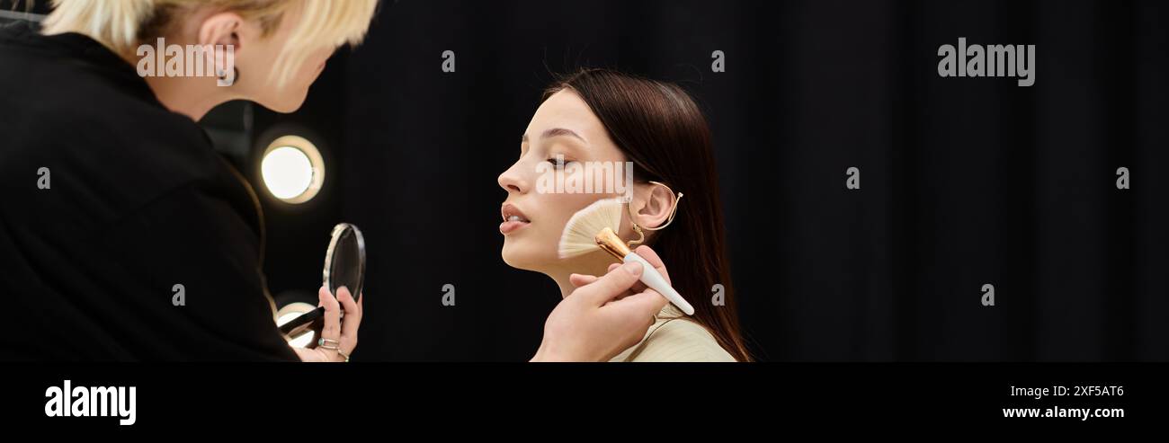 Appealing woman enjoying makeup session with stylist Stock Photo - Alamy