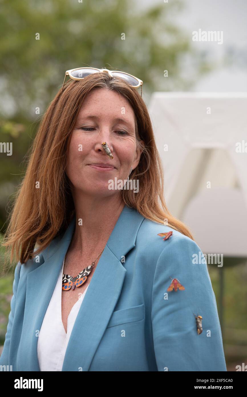 East Molesey, UK. 1st July, 2024. Sarah Mayfield poses with a Buff-Tip ...