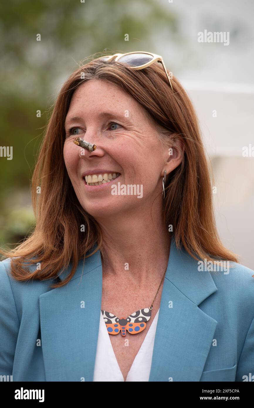 East Molesey, UK. 1st July, 2024. Sarah Mayfield poses with a Buff-Tip ...