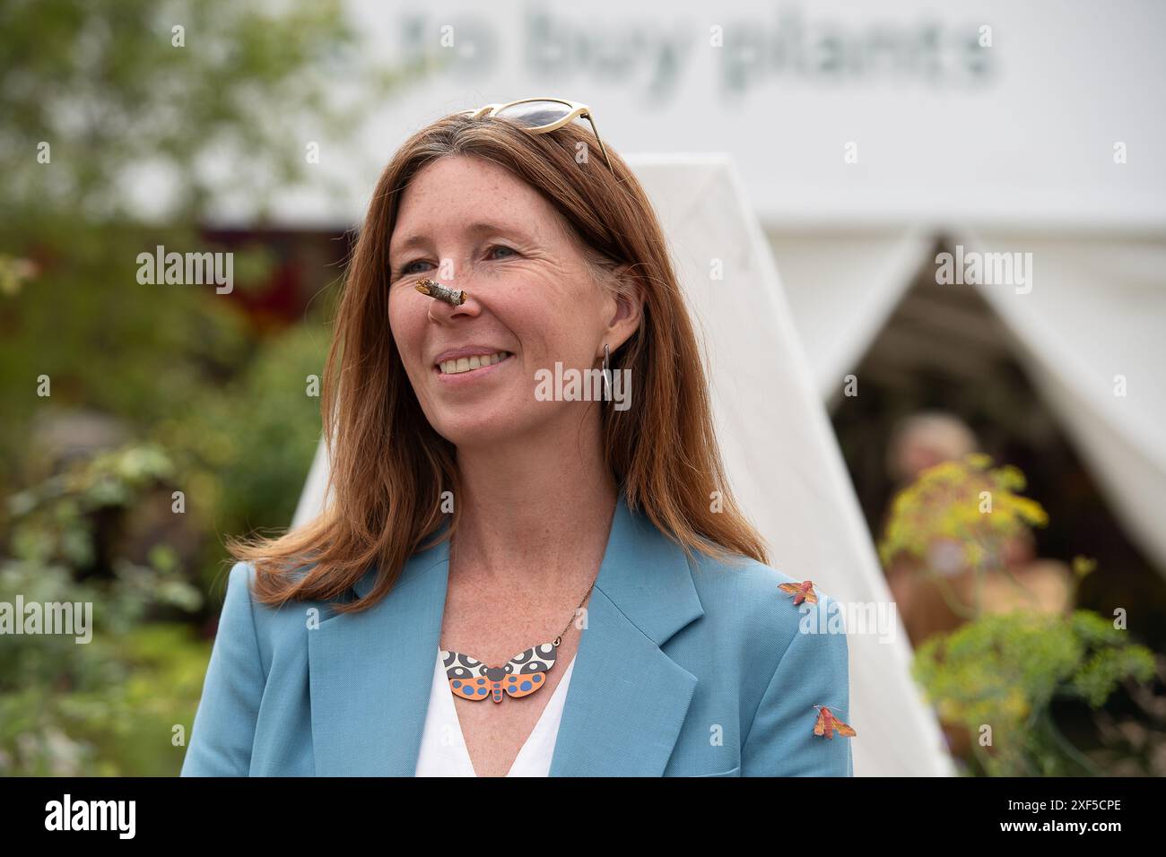 East Molesey, UK. 1st July, 2024. Sarah Mayfield poses with a Buff-Tip ...