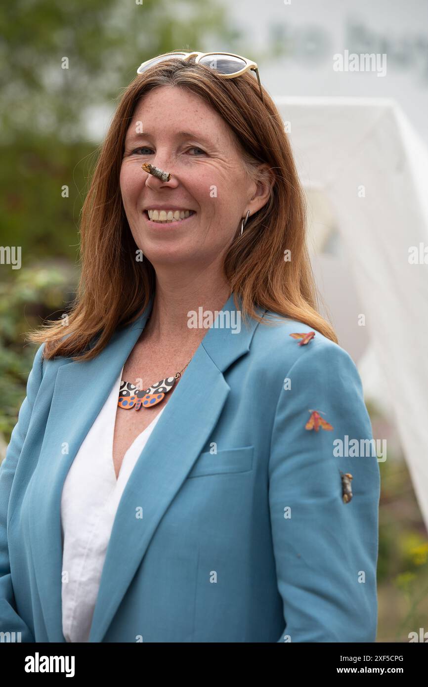 East Molesey, UK. 1st July, 2024. Sarah Mayfield poses with a Buff-Tip ...