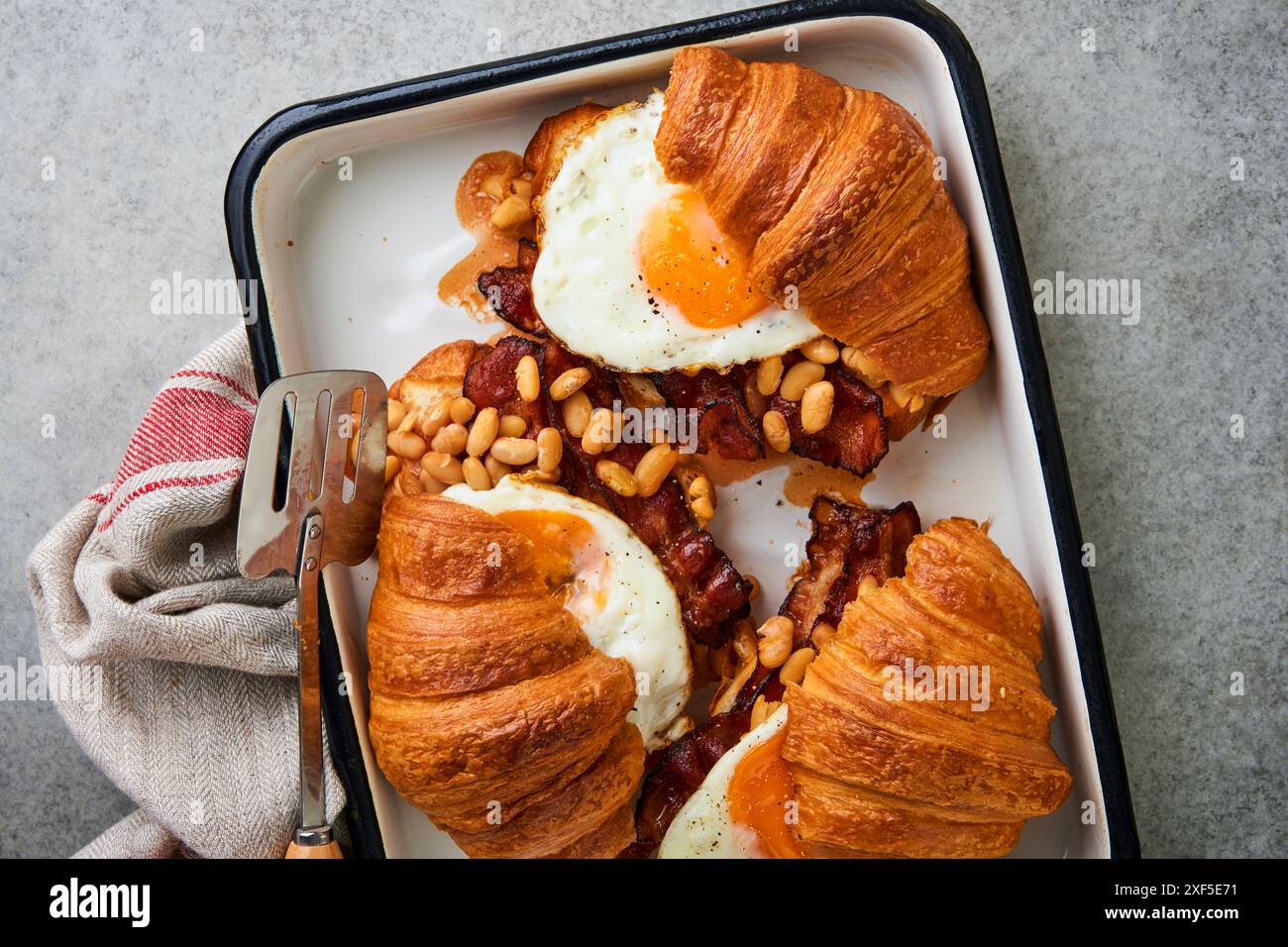Croissants English breakfast. Delicious fresh breakfast grilled three ...