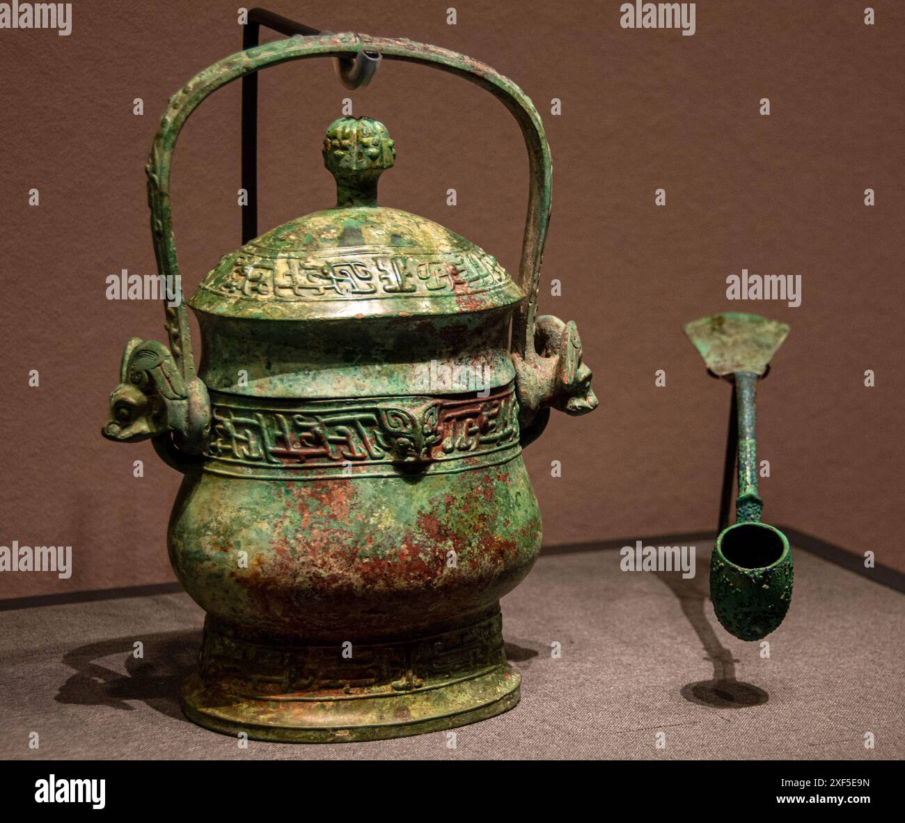 A very rare bronze ritual wine vessel with a ladle from 11th century in ...