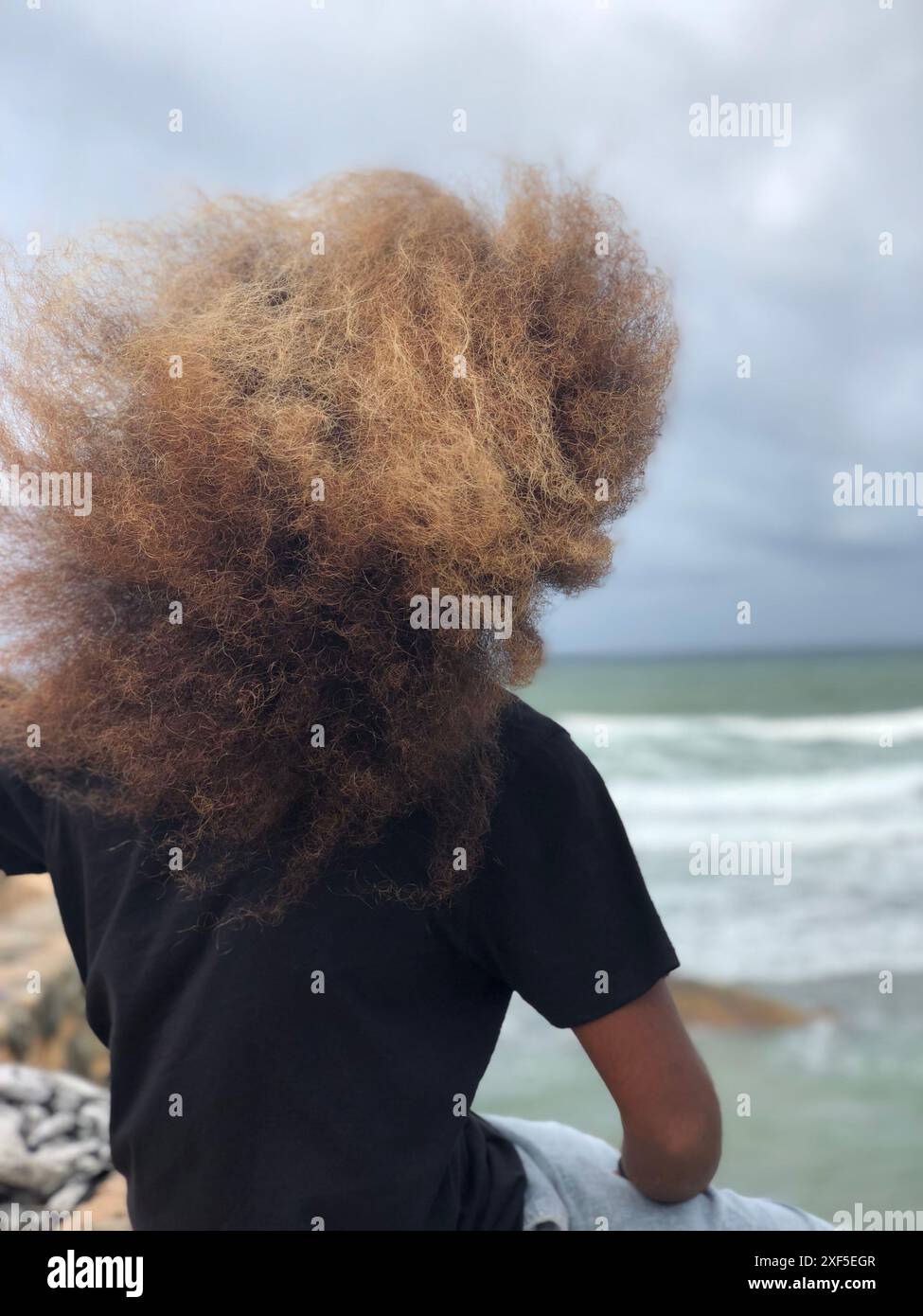 Lonely african american man sitting hi-res stock photography and images ...