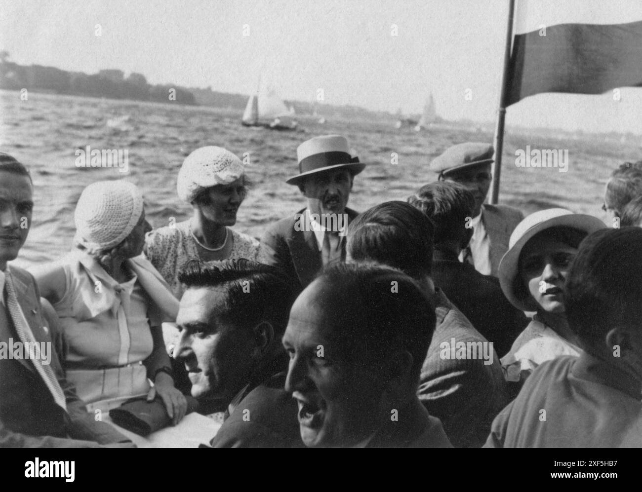 Germany circa.1930 – A group of passengers aboard a pleasure craft on a ...