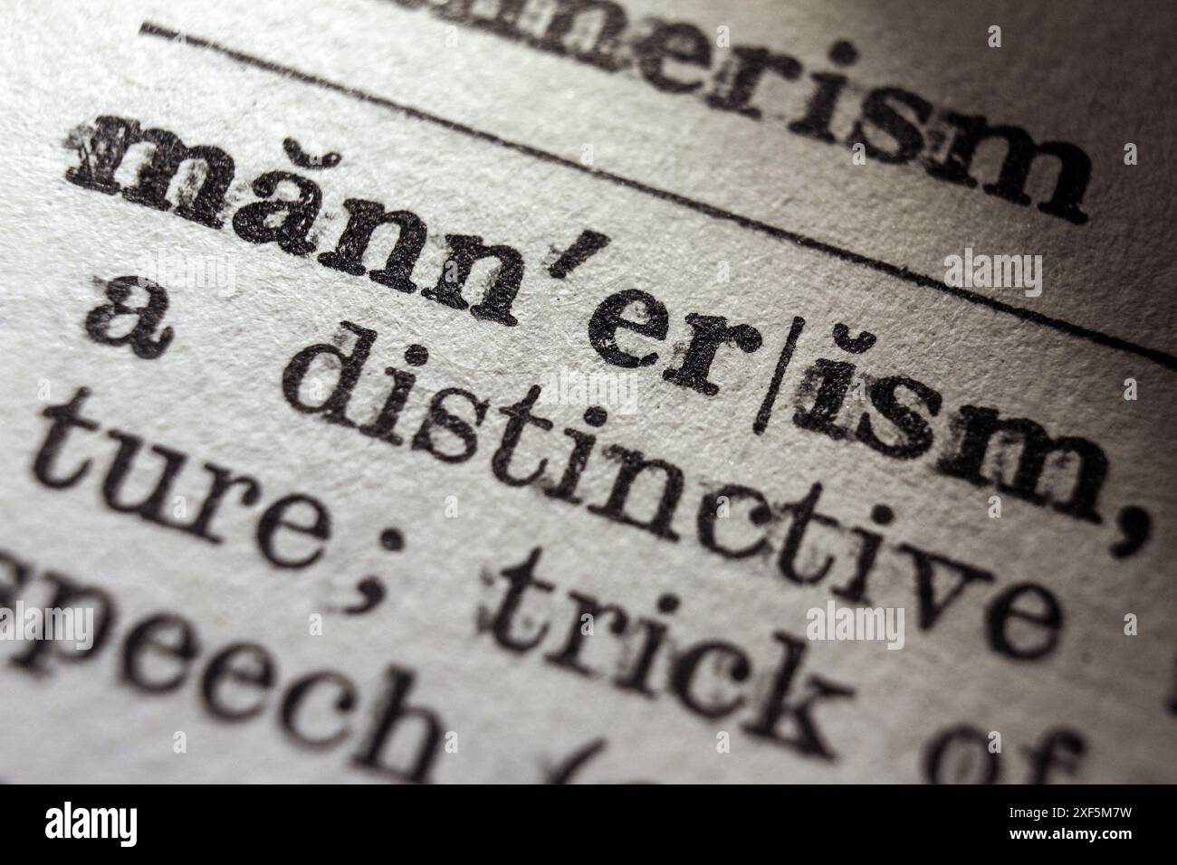 Word mannerism on dictionary page, macro close-up Stock Photo - Alamy
