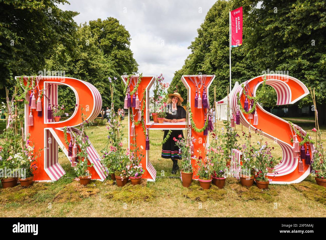 London, UK. 01st July, 2024. Hannah from Minnow and Wolf Flowers poses ...