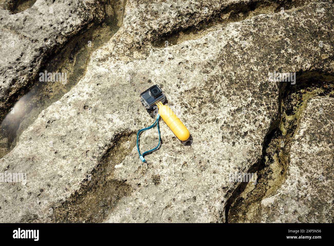 Compact underwater photo and video camera. Rocky shore of the Caspian ...