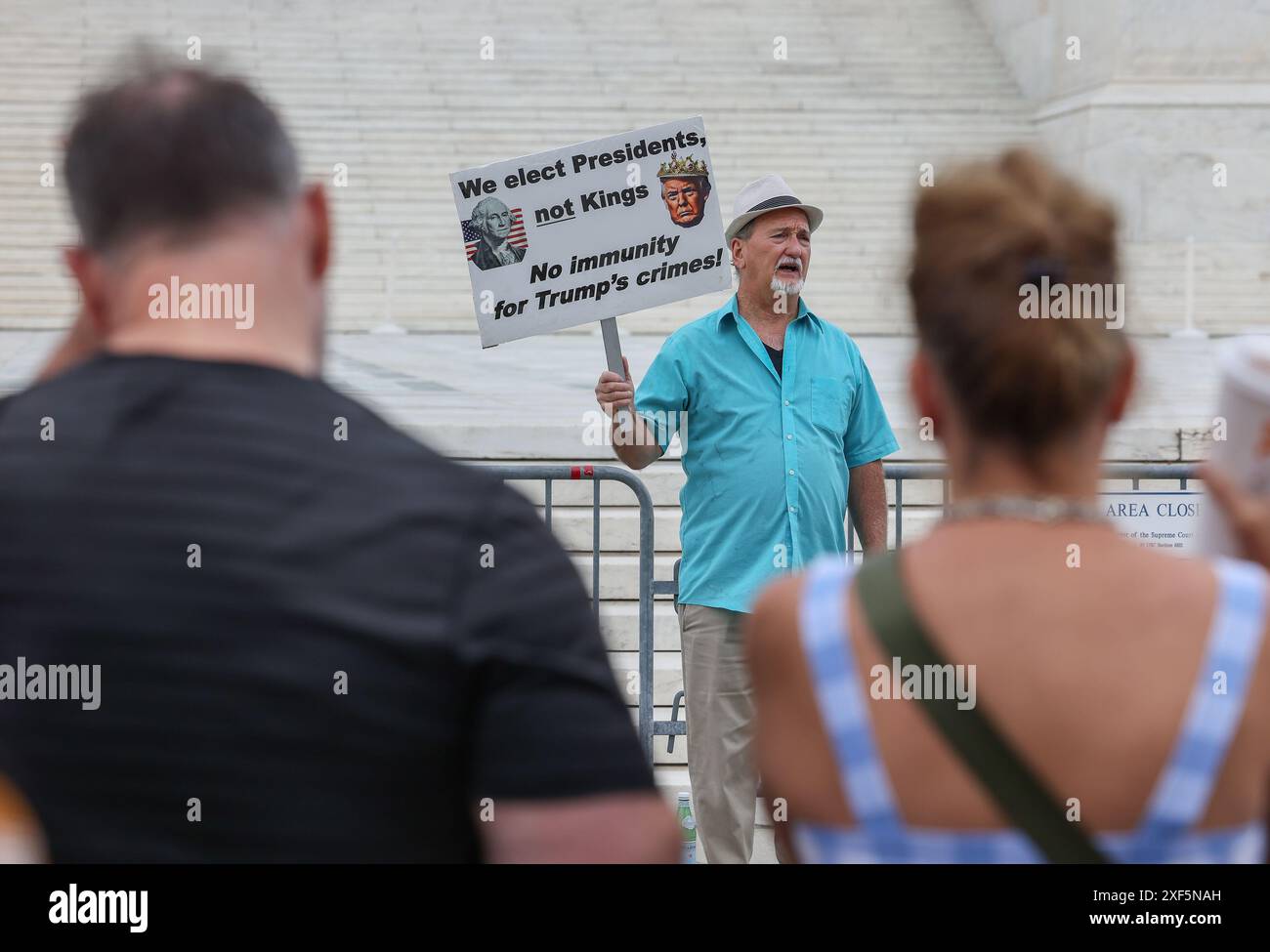 Washington DC, USA. 01st July, 2024. Gary Roush holds up a sign outside ...