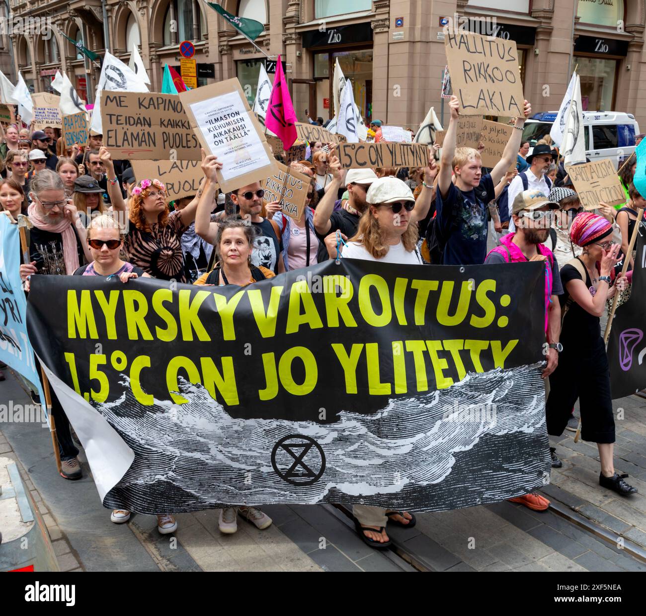 ‘Storm warning’ protest held by Extinction Rebellion Finland marching ...