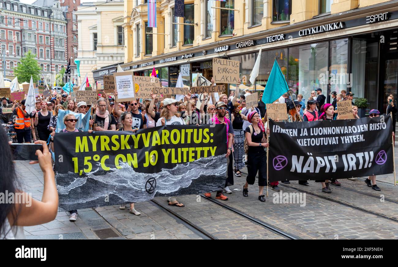 ‘Storm warning’ protest held by Extinction Rebellion Finland marching ...