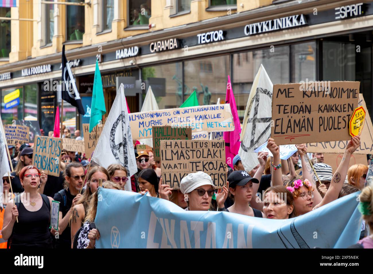 ‘Storm warning’ protest held by Extinction Rebellion Finland marching ...