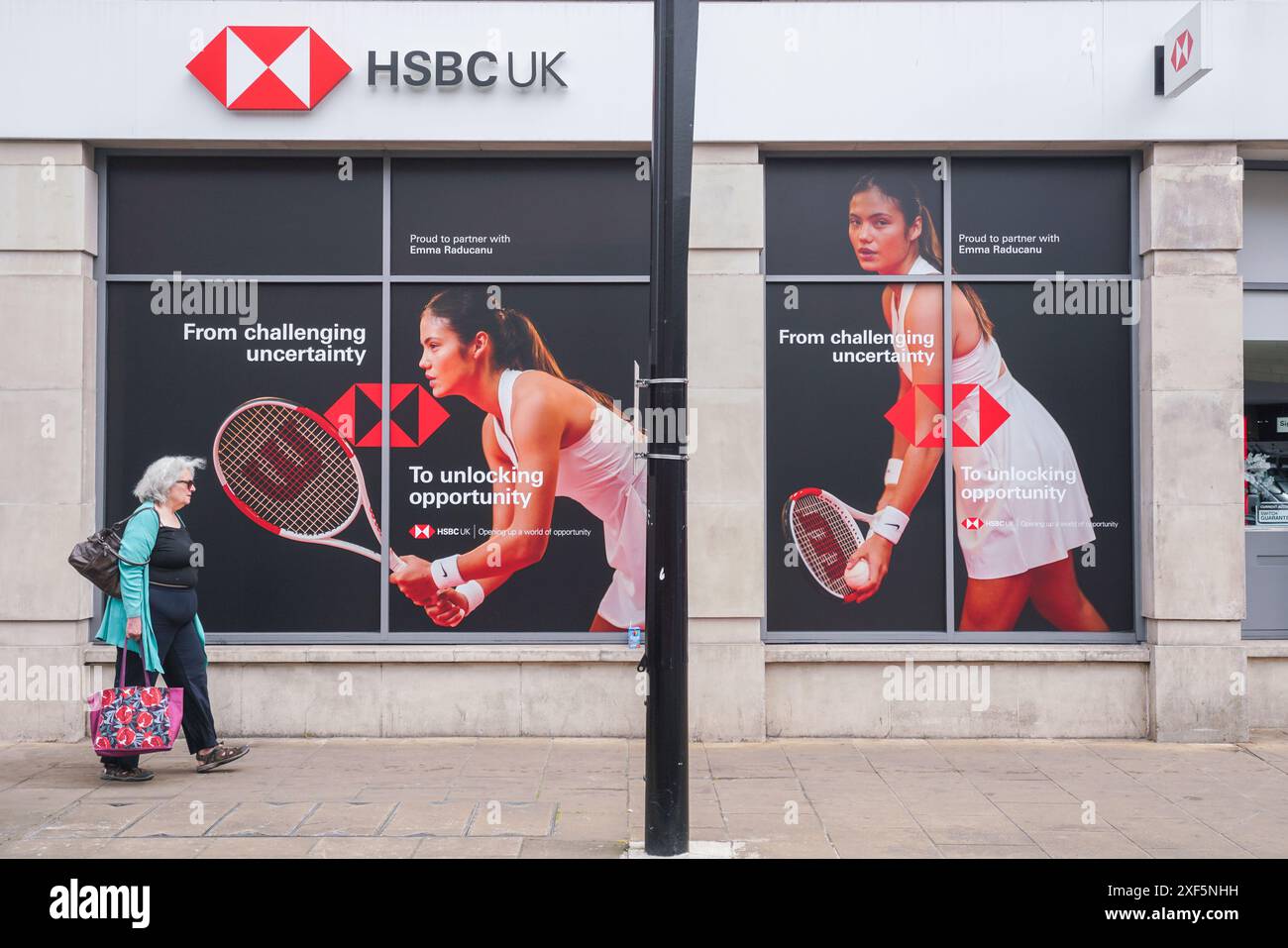 Wimbledon, London, UK 1 July 2024. A pedestrian walks past a local ...