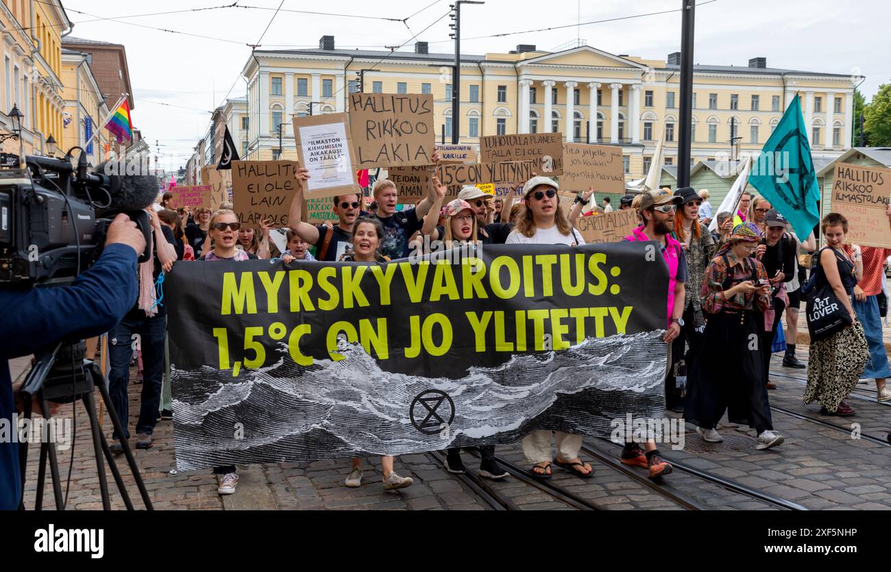 ‘Storm warning’ protest held by Extinction Rebellion Finland arriving ...