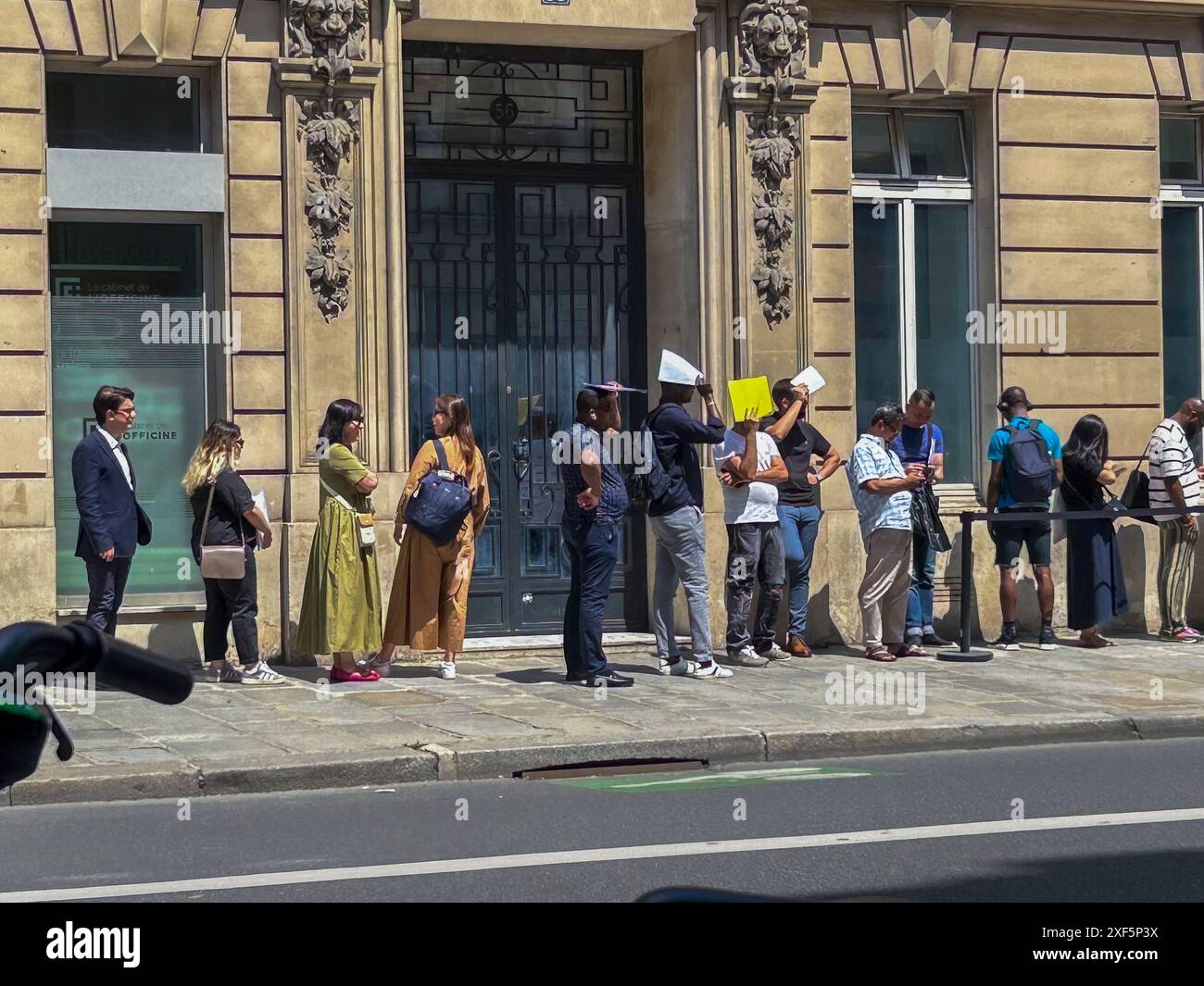 Paris, France, Small Crowd People, Lining up queuing, Waiting to apply ...