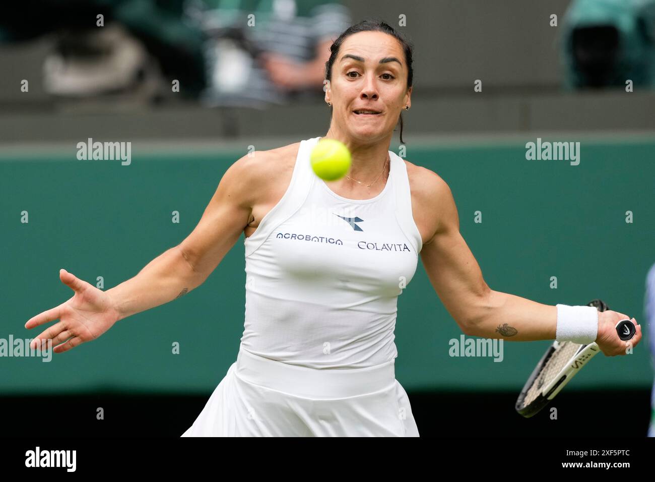 Martina Trevisan of Italy plays a forehand return to Madison Keys of ...