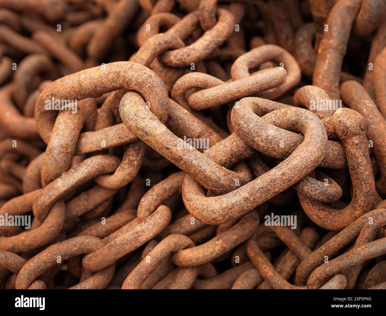 Rusty dockyard chains Stock Photo - Alamy